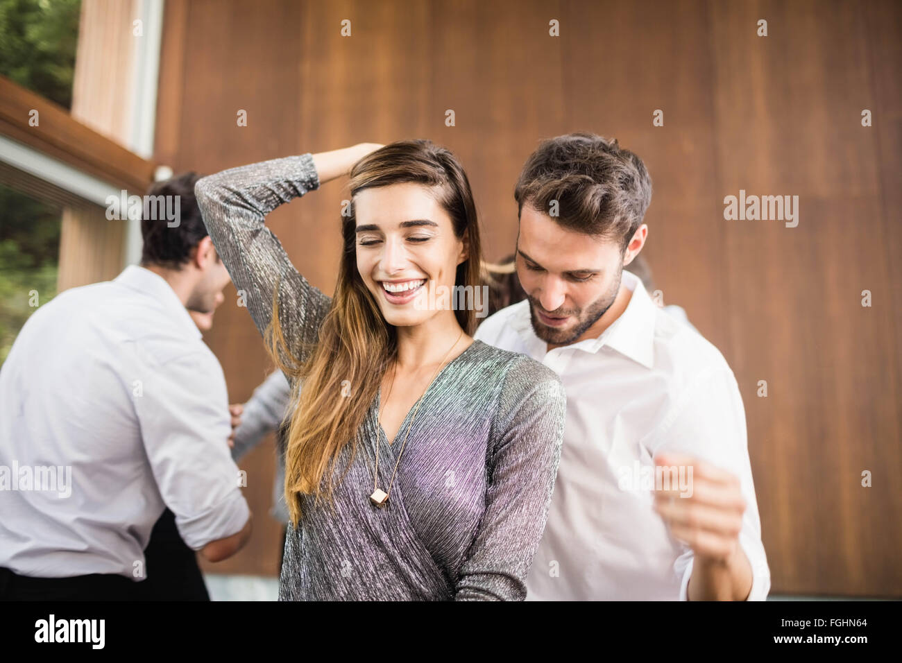 Group of young friends dancing Stock Photo - Alamy