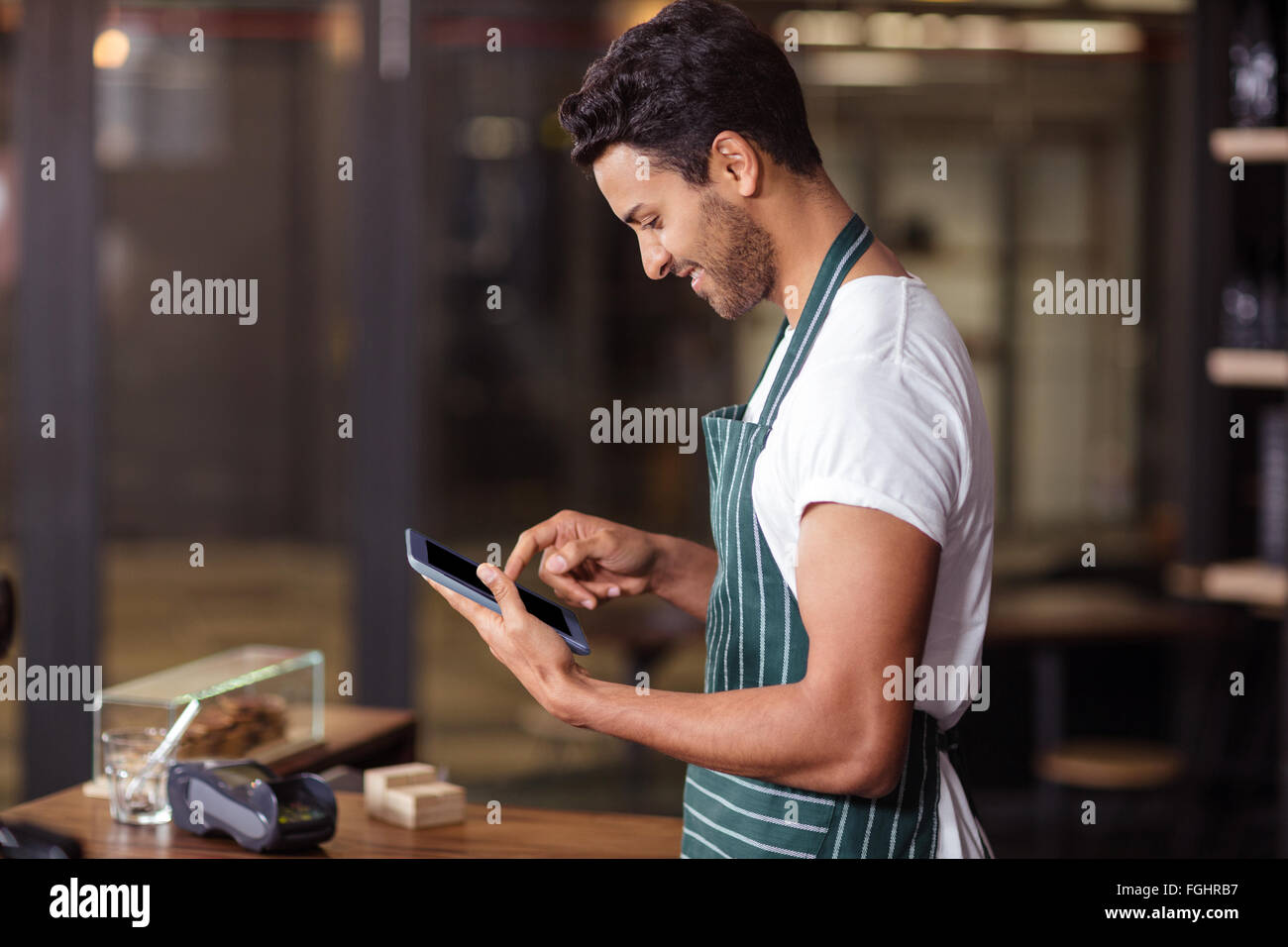 Side view male barista hi-res stock photography and images - Alamy