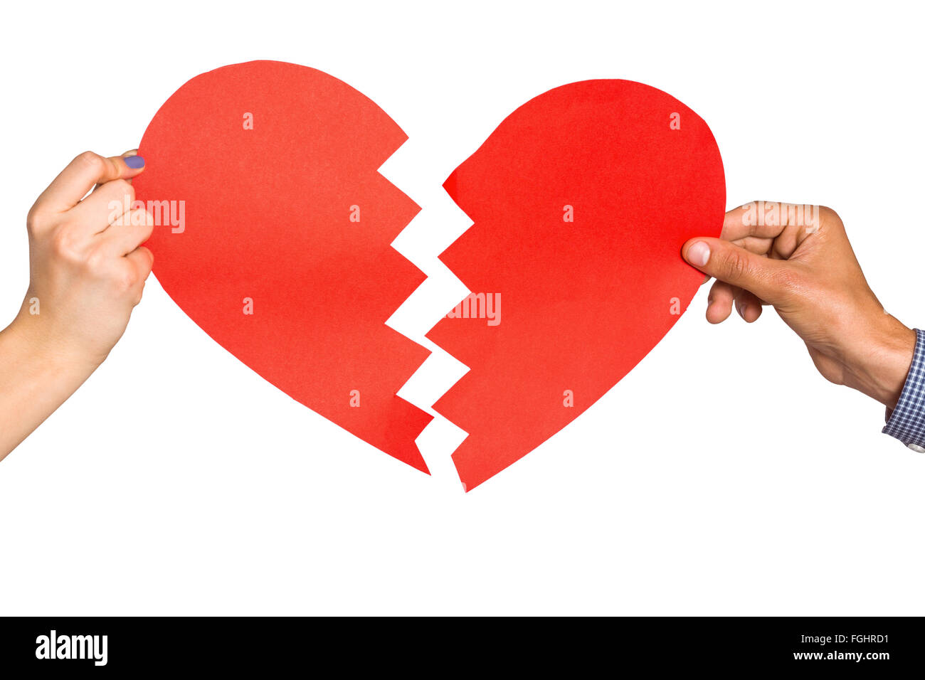 Two hands holding broken heart Stock Photo - Alamy