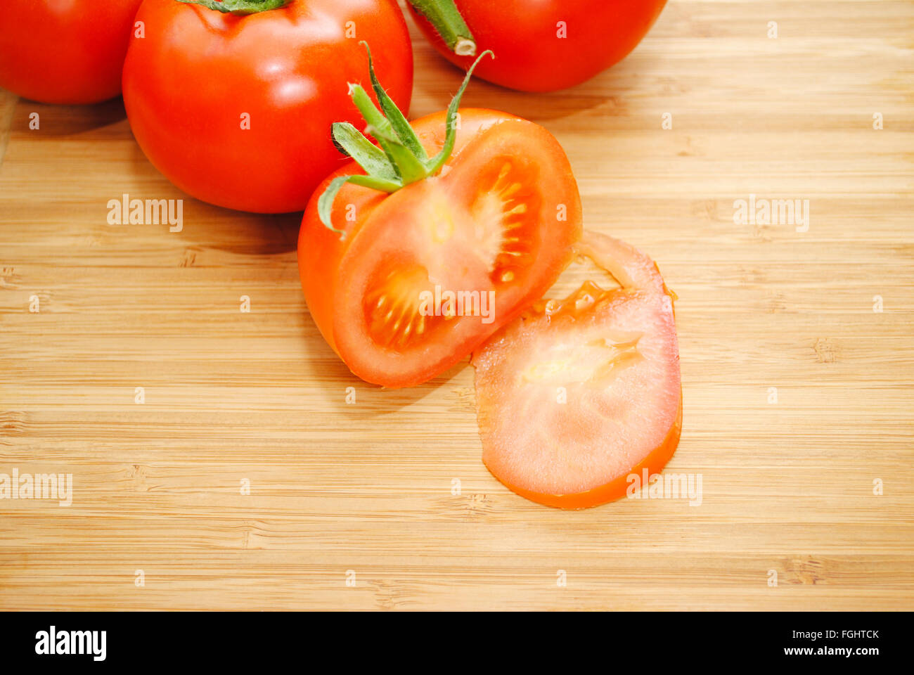 Whole sliced organic tomatoes hi-res stock photography and images - Alamy