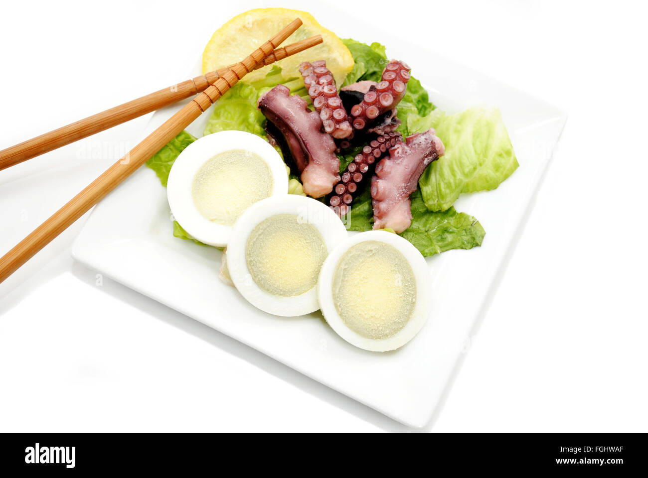 Delicious Octopus with Eggs as Part of a Healthy Meal Stock Photo - Alamy