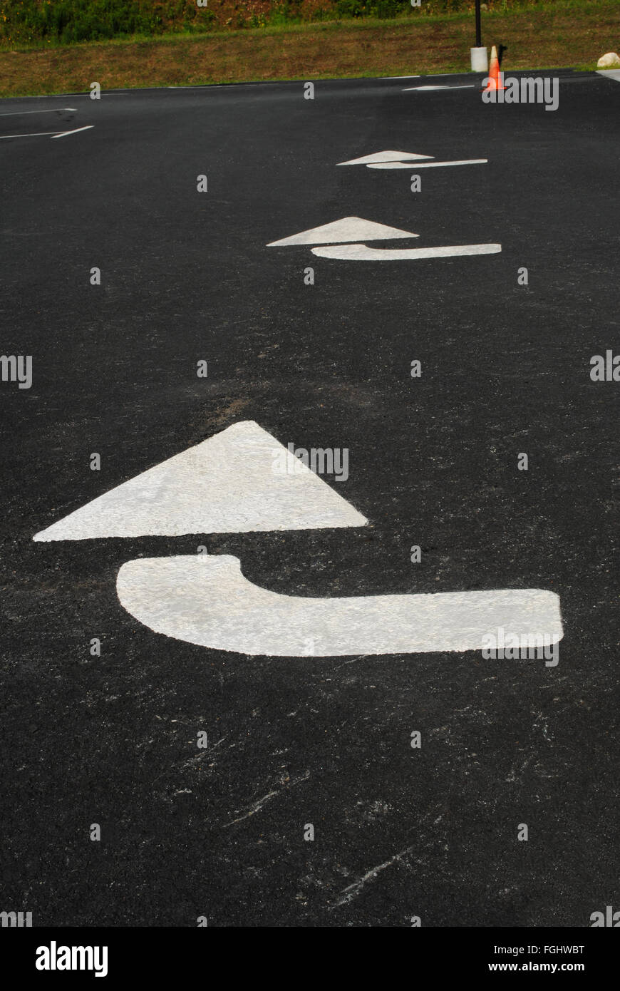 Arrow Directional Painted Road Sign Stock Photo - Alamy