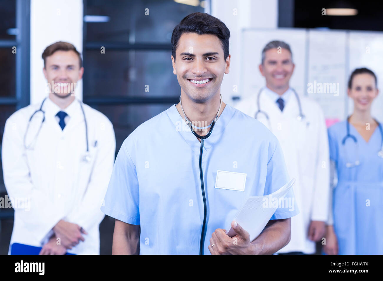 Portrait of medical team standing together Stock Photo - Alamy