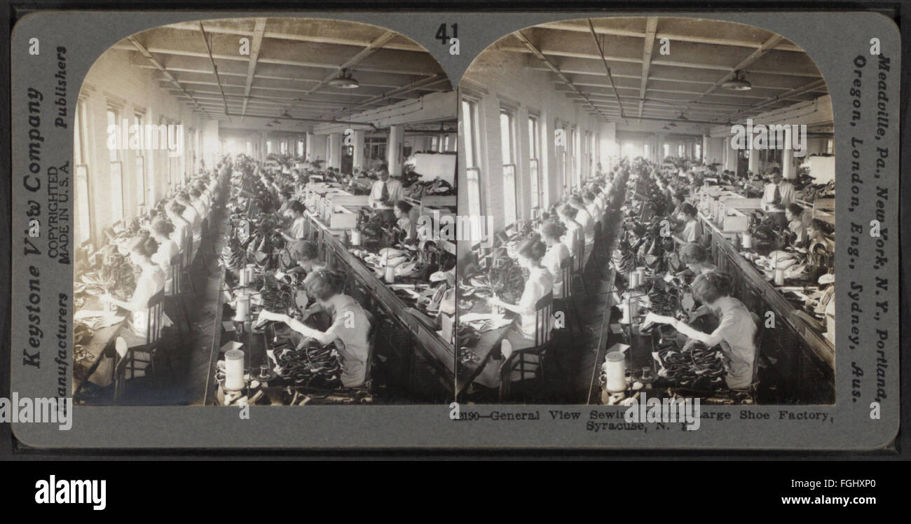 This image by Keystone View Company shows the sewing room of a large ...