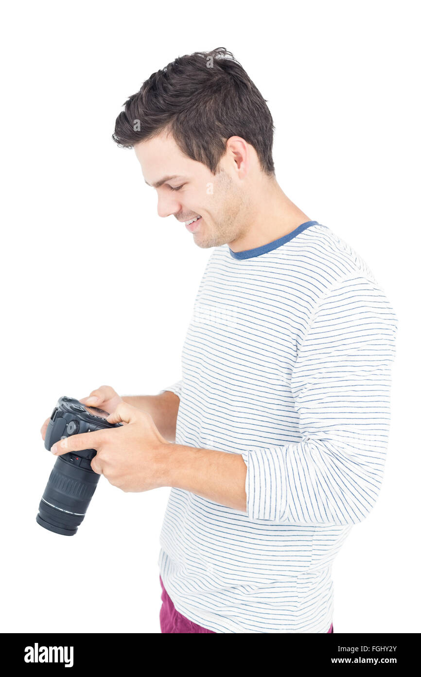 Man taking picture with professional camera Stock Photo - Alamy
