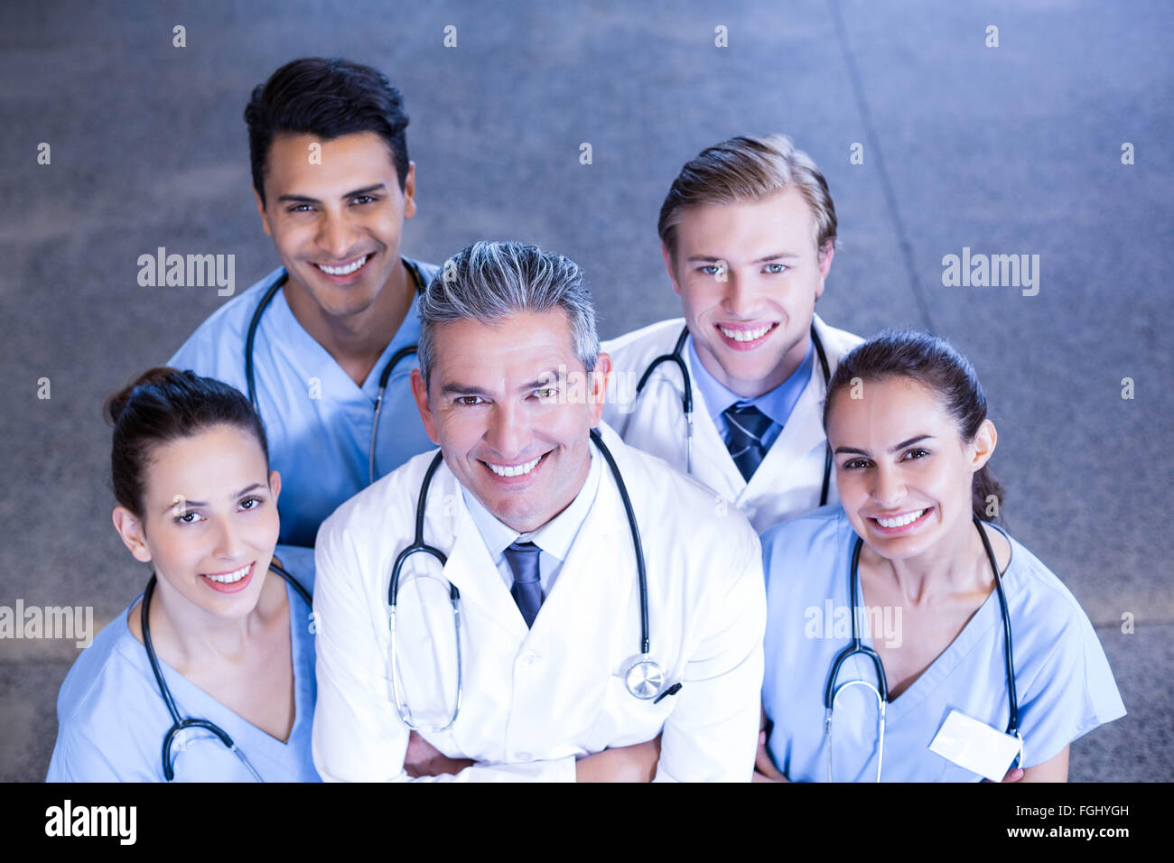 Medical team standing crossed arms hi-res stock photography and images ...