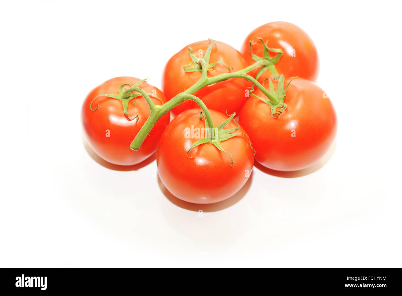 Five Vine Ripened Tomatoes Isolated on White Stock Photo - Alamy