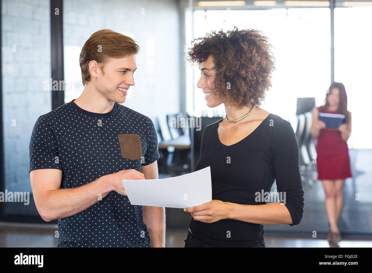Business partners reading document hi-res stock photography and images ...