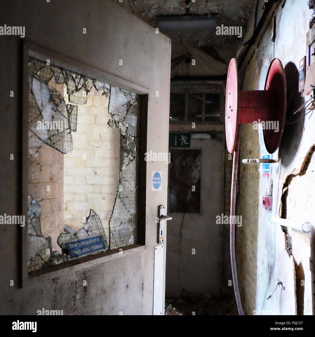 Fire escape door in an abandoned hospital building. U.K Stock Photo - Alamy
