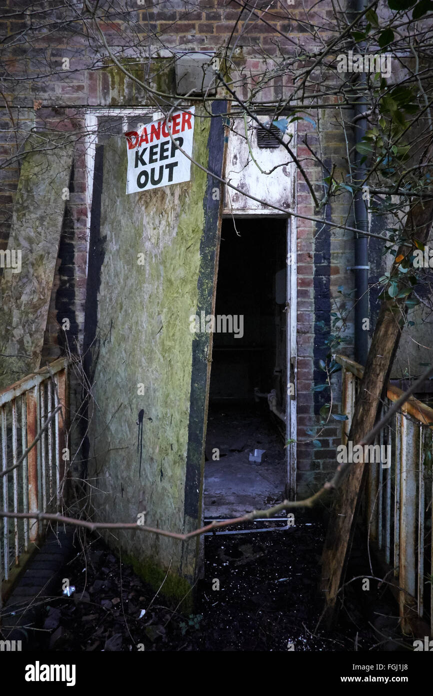 An abandoned entrance door in Harperbury Hospital, Harper Lane, Shenley ...