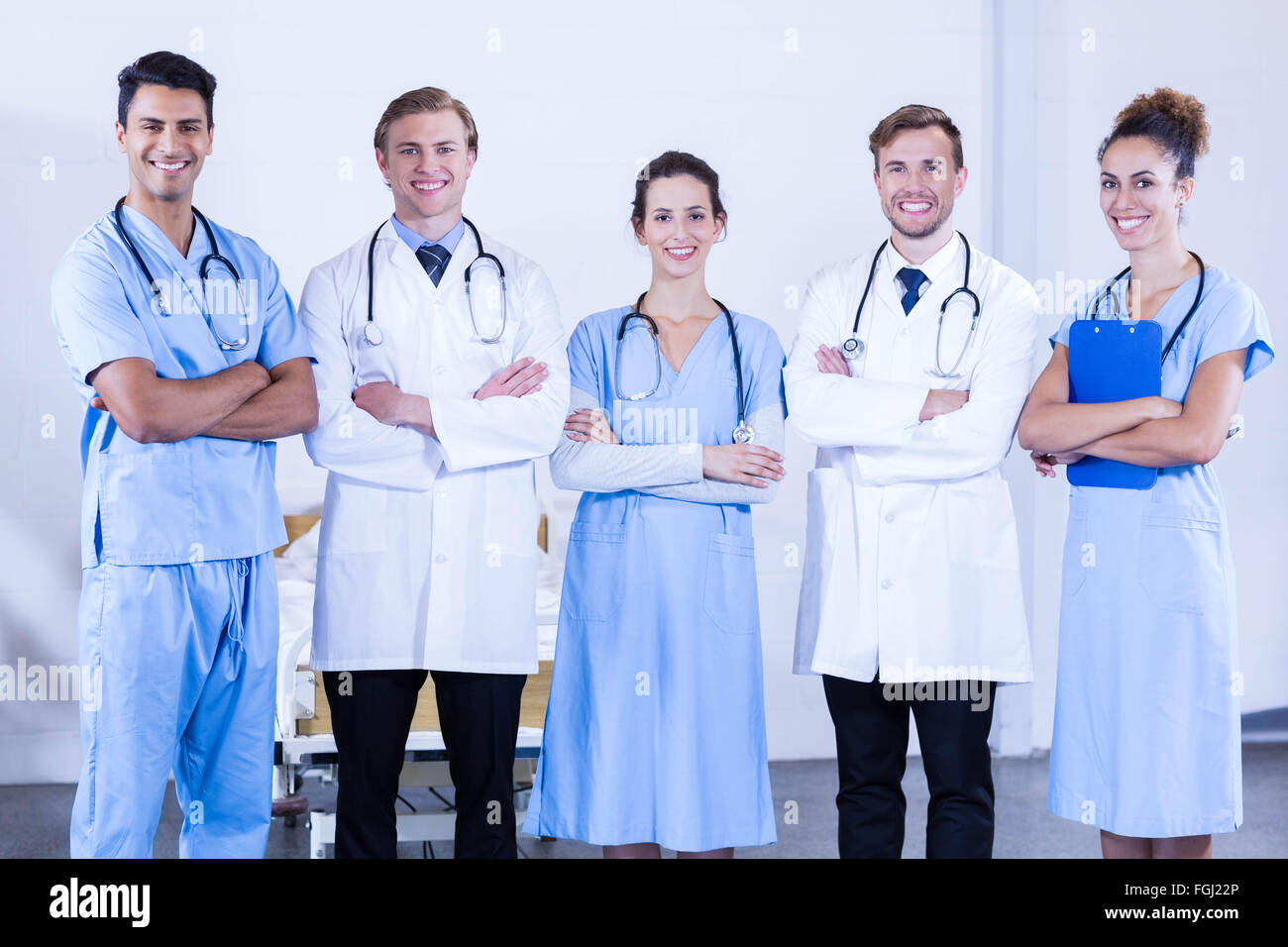 Portrait of medical team standing together Stock Photo - Alamy