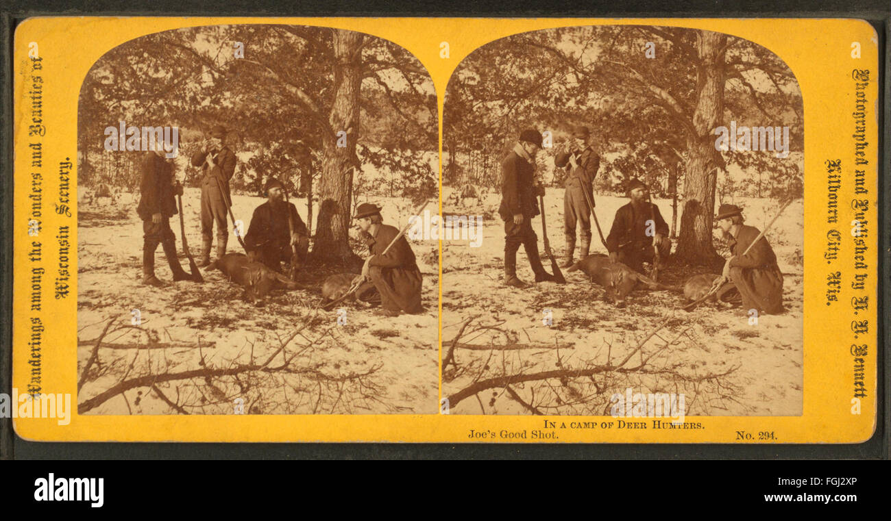 Photograph depicting a group of deer hunters in a camp, capturing early ...