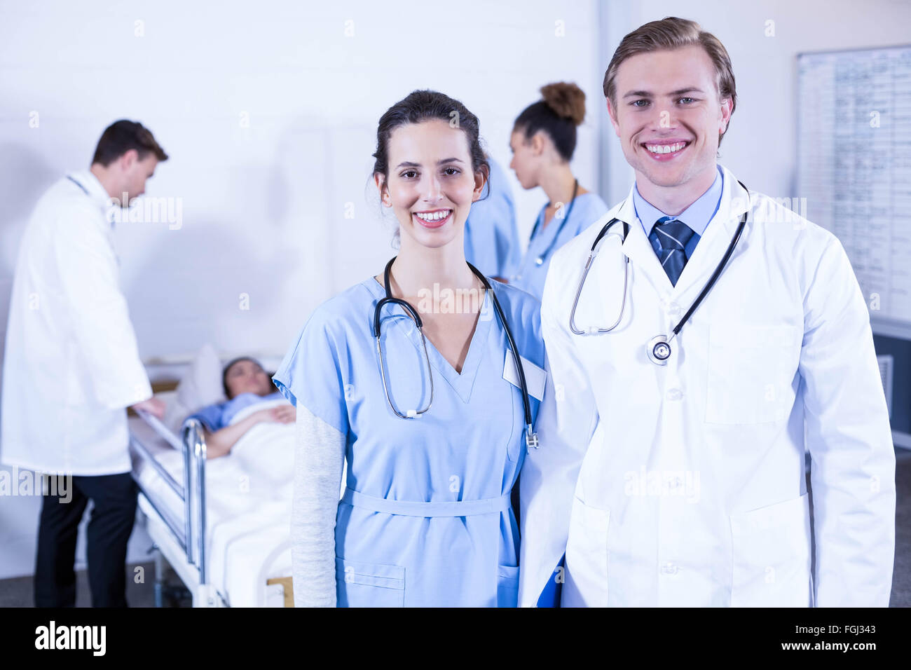 Portrait of doctors smiling at camera Stock Photo - Alamy