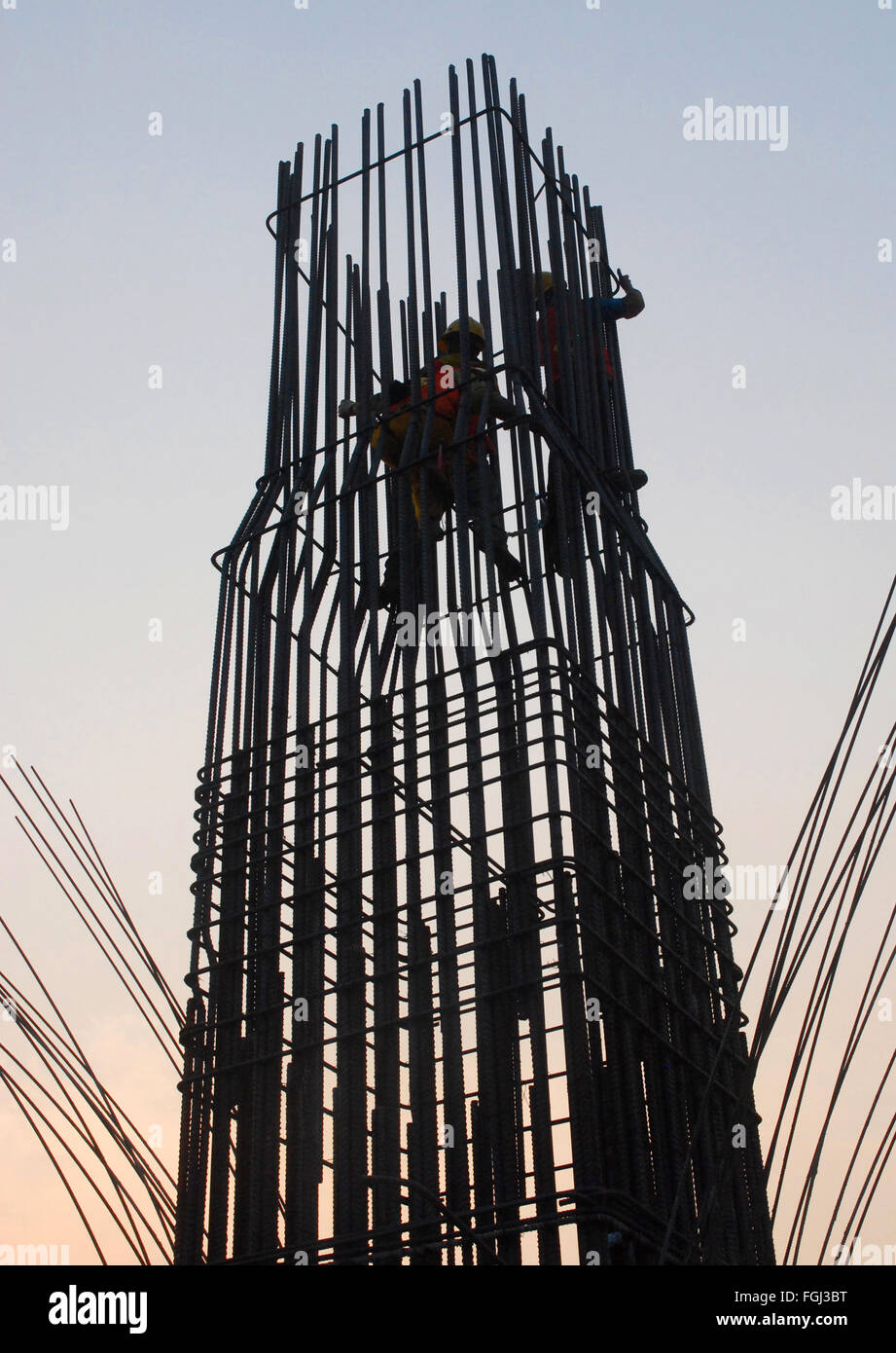 Jakarta, Indonesia. 20th Oct, 2015. Workers complete the flyover region ...