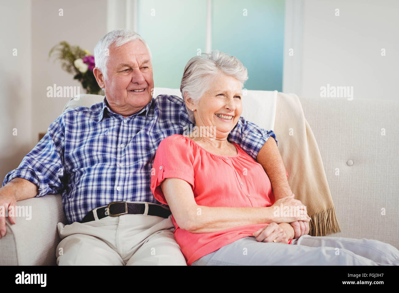Cheerful old couple sitting hi-res stock photography and images - Alamy
