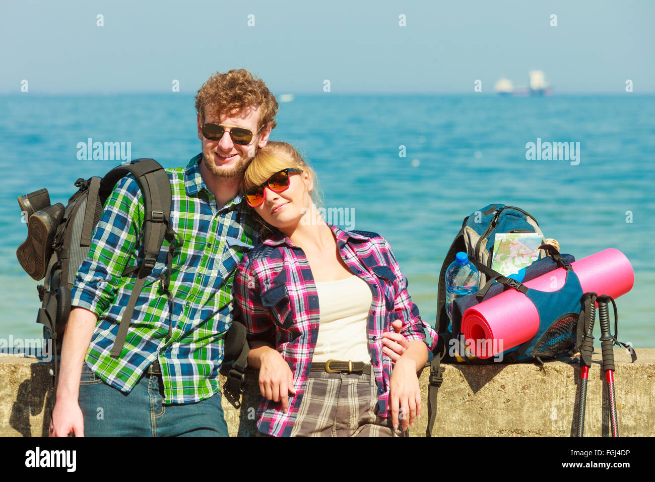 Adventure, summer, tourism active lifestyle. Young couple backpacker ...