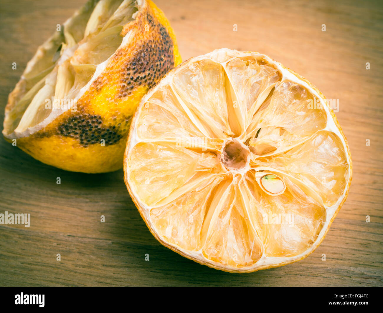 Closeup old rotten piece of lemon. Bad unhealthy food Stock Photo - Alamy