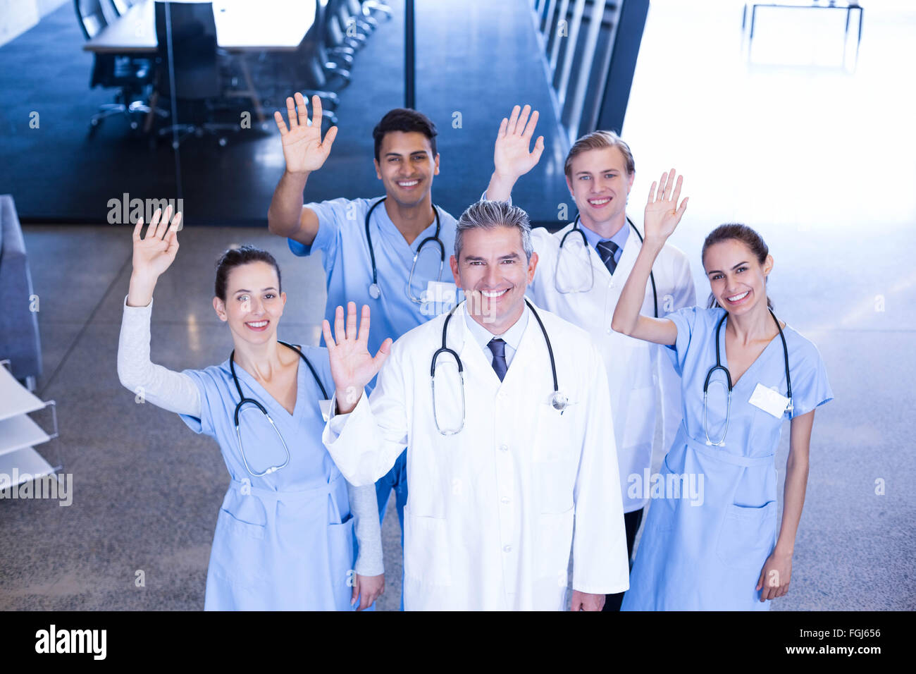 Group happy employees standing hi-res stock photography and images - Alamy