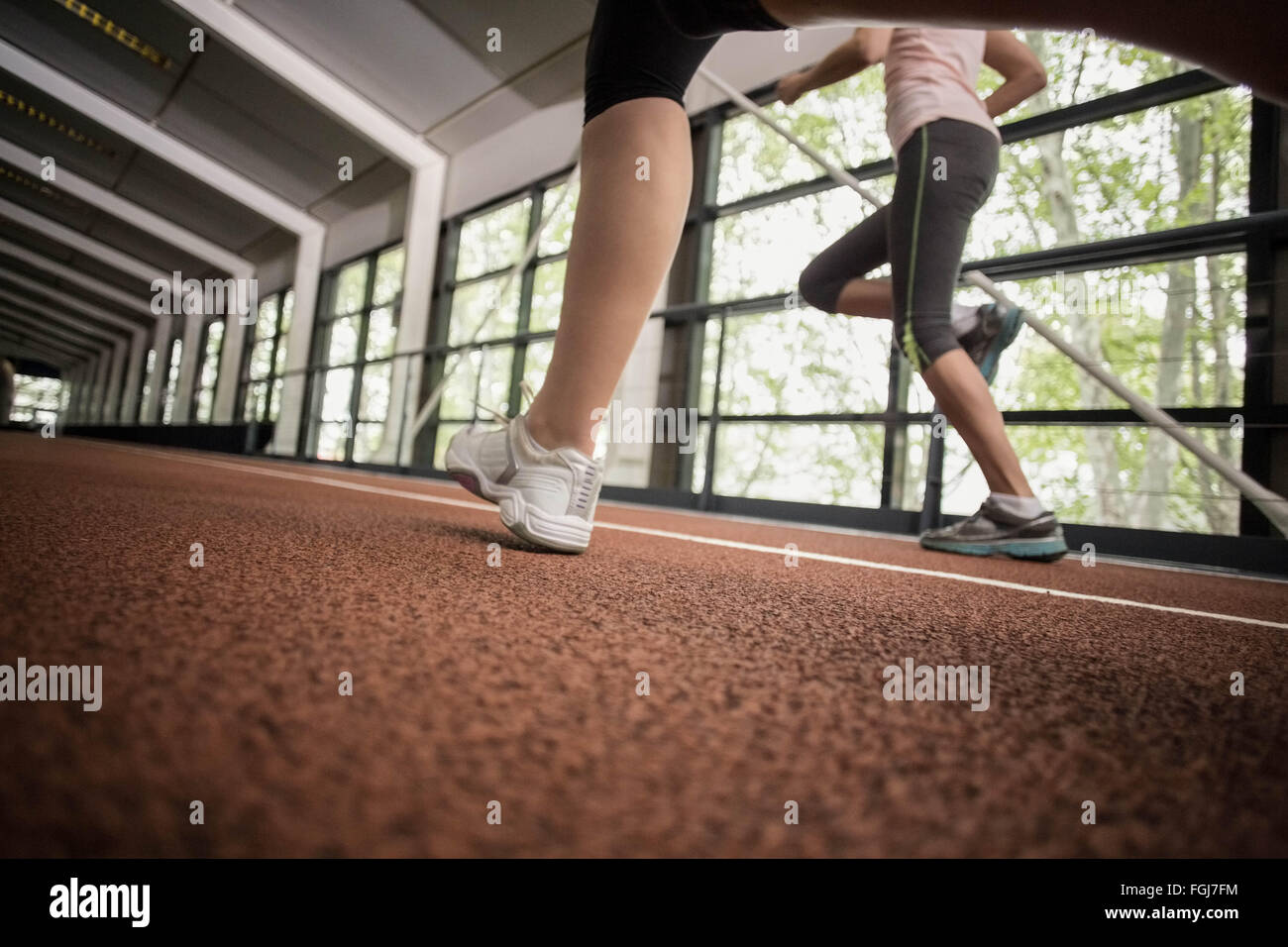 Athletic women running Stock Photo - Alamy