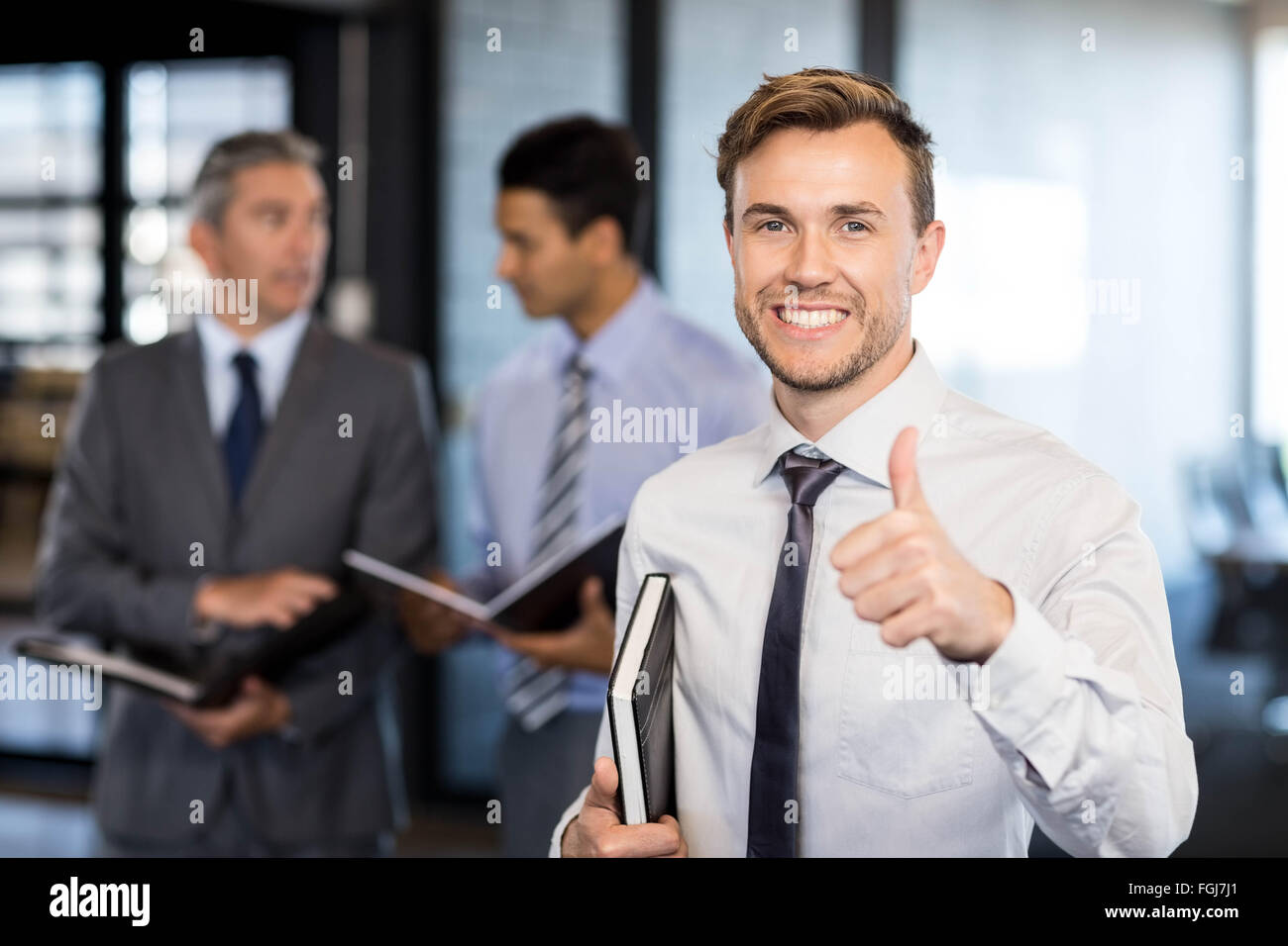 Successful businessman celebrating his victory Stock Photo - Alamy