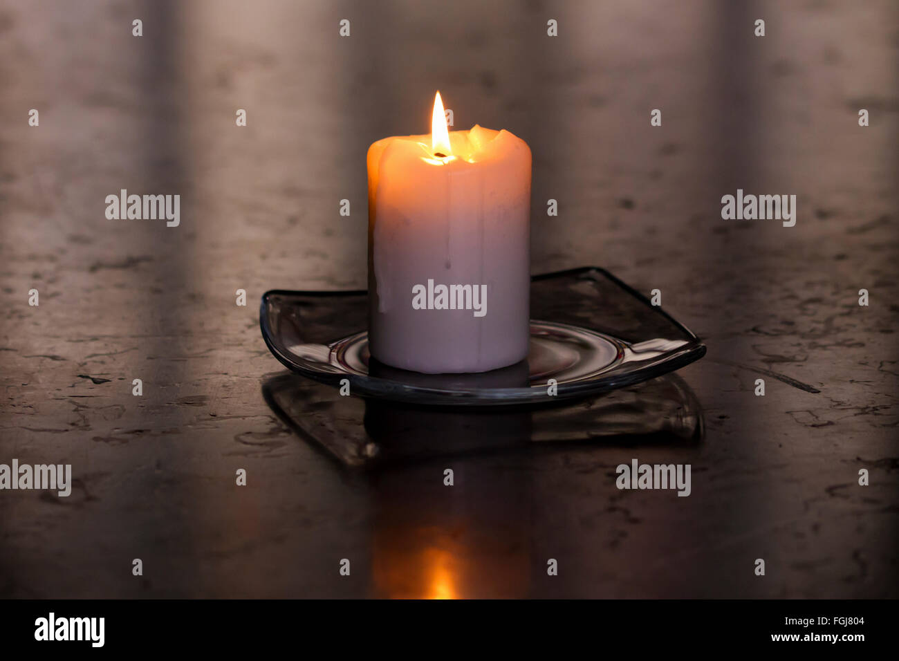 Single candle burning hi-res stock photography and images - Alamy