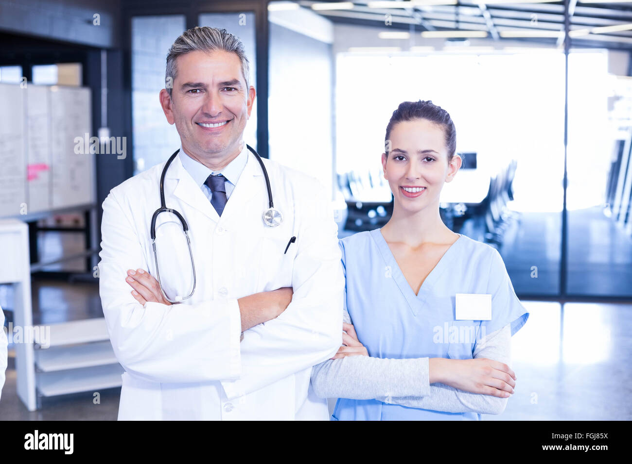 Portrait of doctor and nurse standing together Stock Photo - Alamy