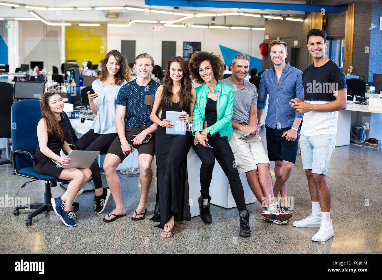 Group of colleagues in office Stock Photo - Alamy