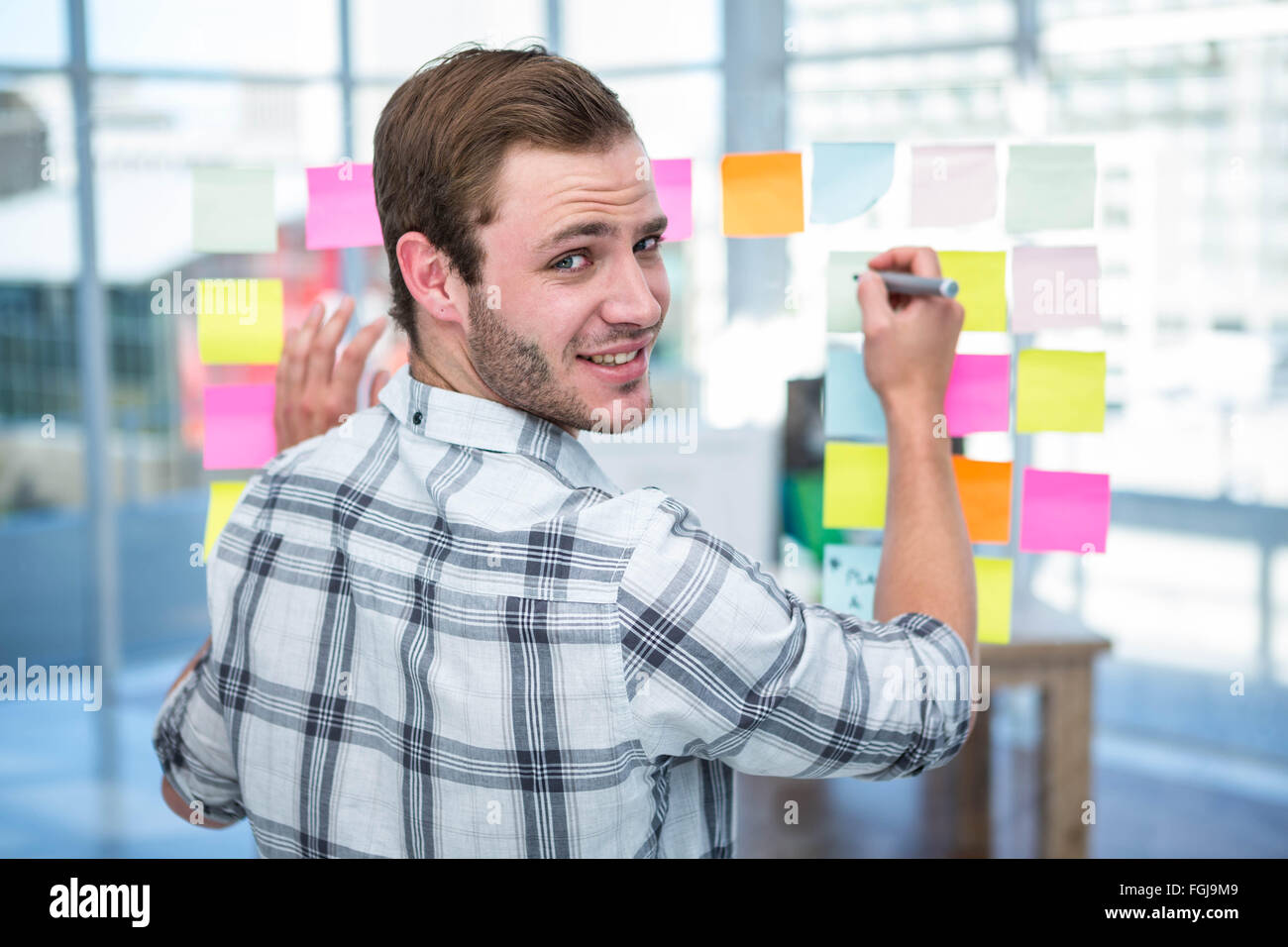 Business man post it notes on hi-res stock photography and images - Alamy