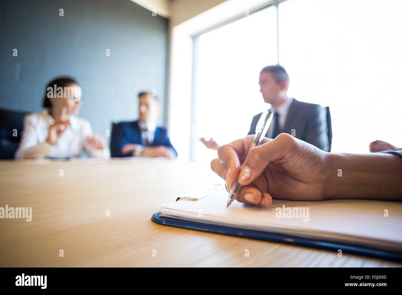 Business people discussing in conference meeting Stock Photo - Alamy