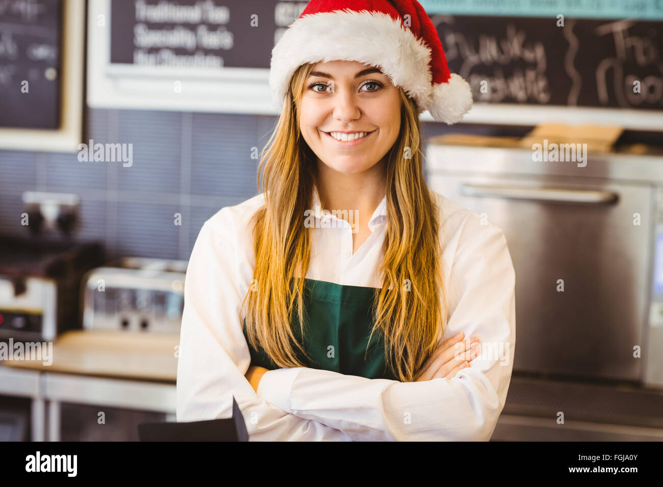 Cute waitress standing behind the counter Stock Photo - Alamy