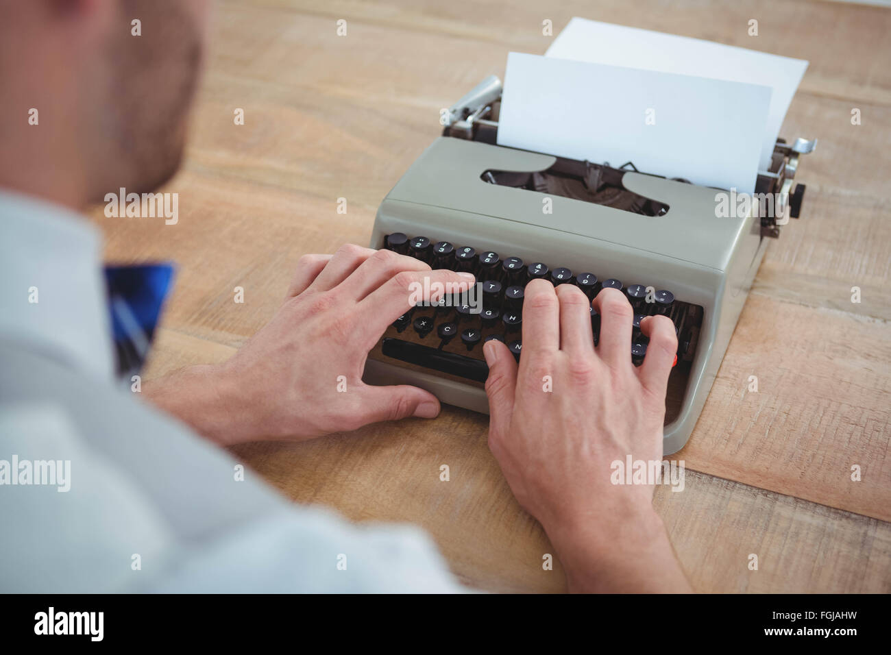 Typing man on retro typewriter hi-res stock photography and images - Alamy