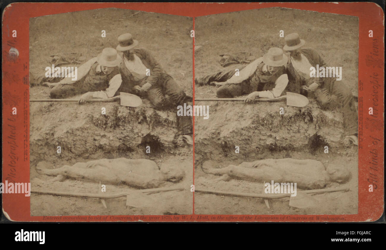 A photograph by W.L. Hall showing a petrified body, believed to be from ...