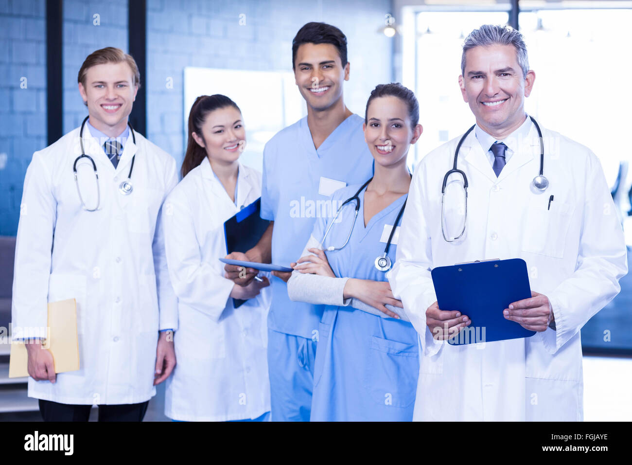 Portrait of medical team standing together Stock Photo - Alamy