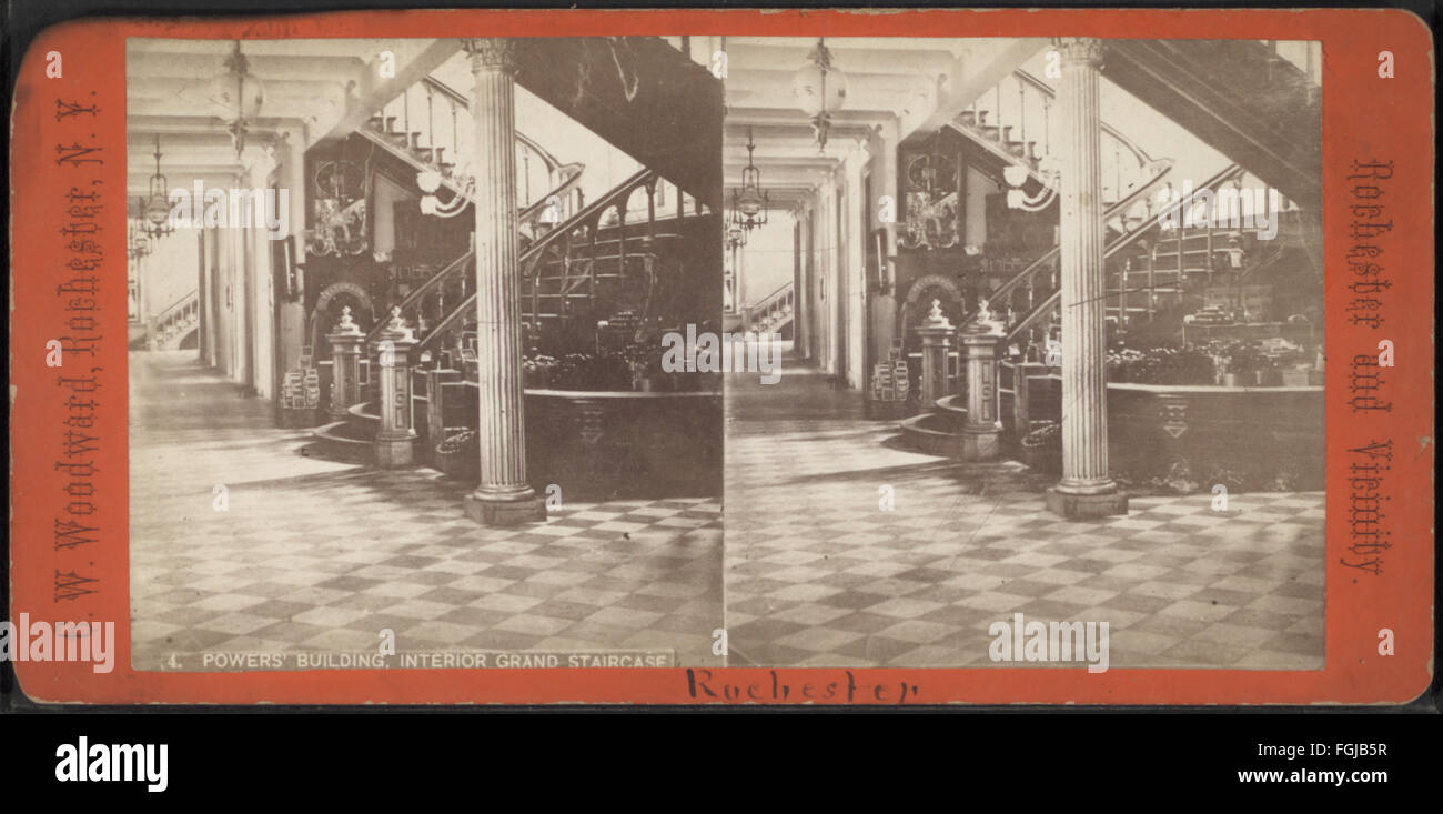 A photograph of the interior grand staircase of the Powers' Building ...