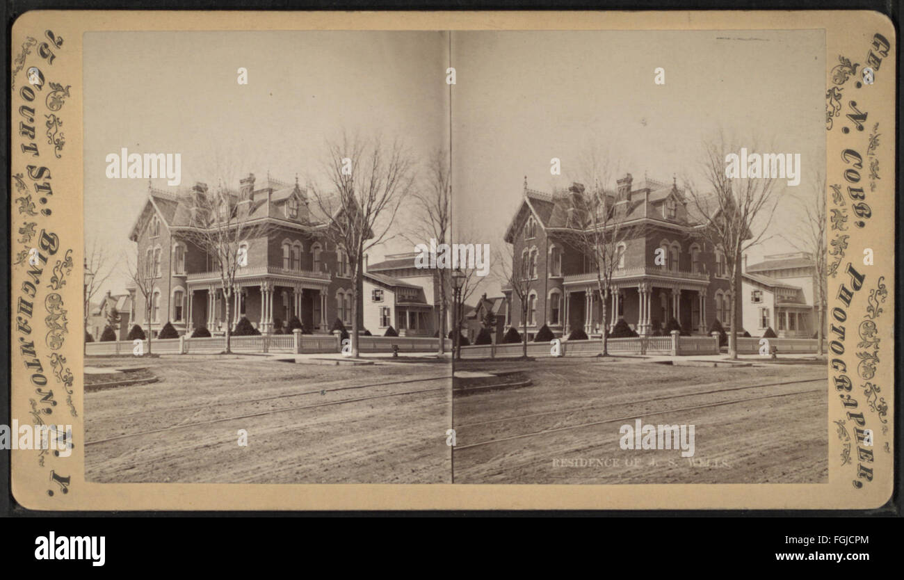 A photograph by George N. Cobb showing the residence of J.S. Wells ...