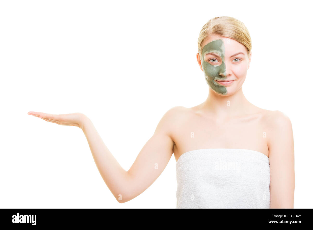 Woman facial mask holding Cut Out Stock Images & Pictures - Alamy