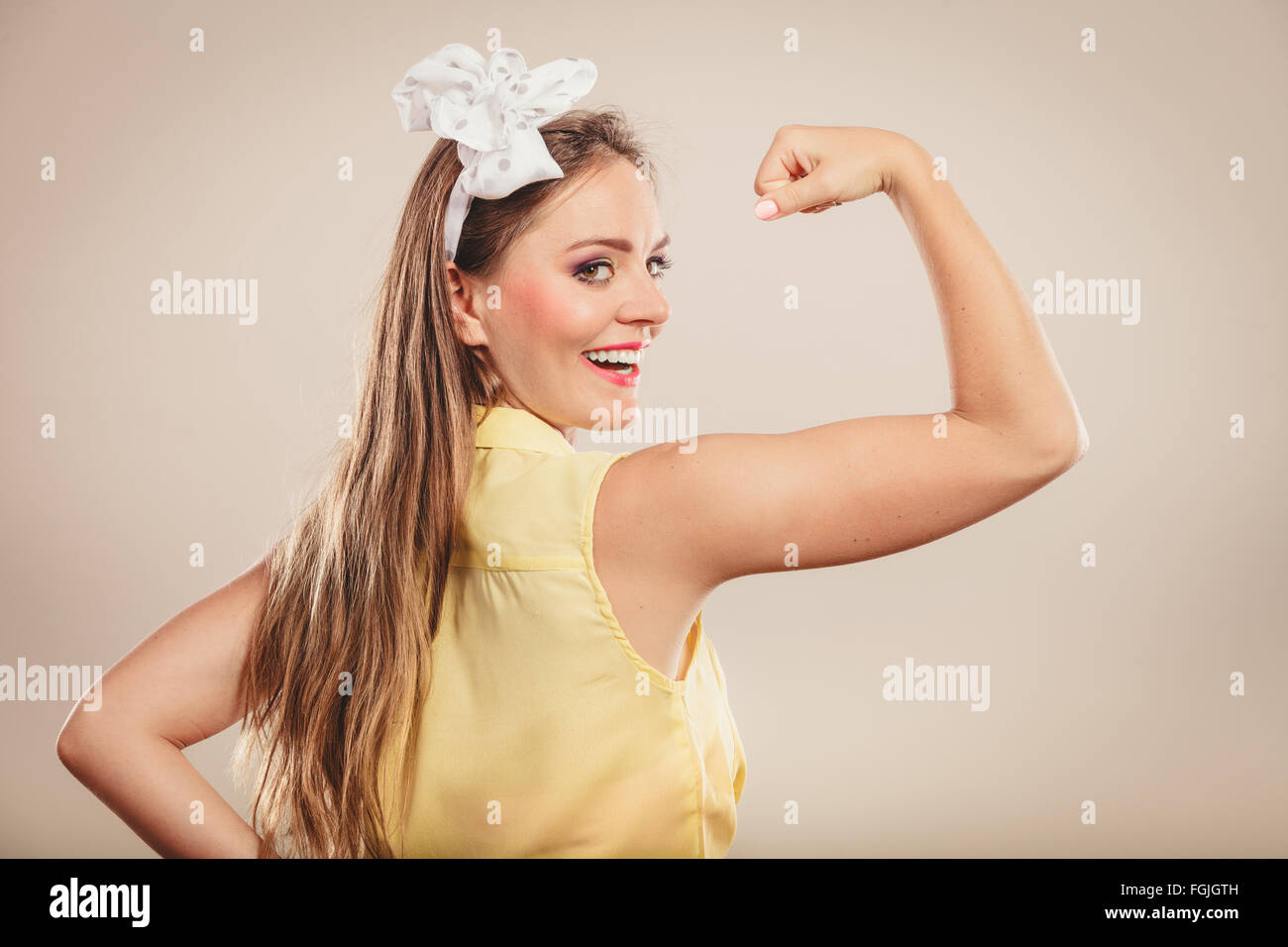 Happy strong pretty retro pin up girl woman showing off muscles Stock ...