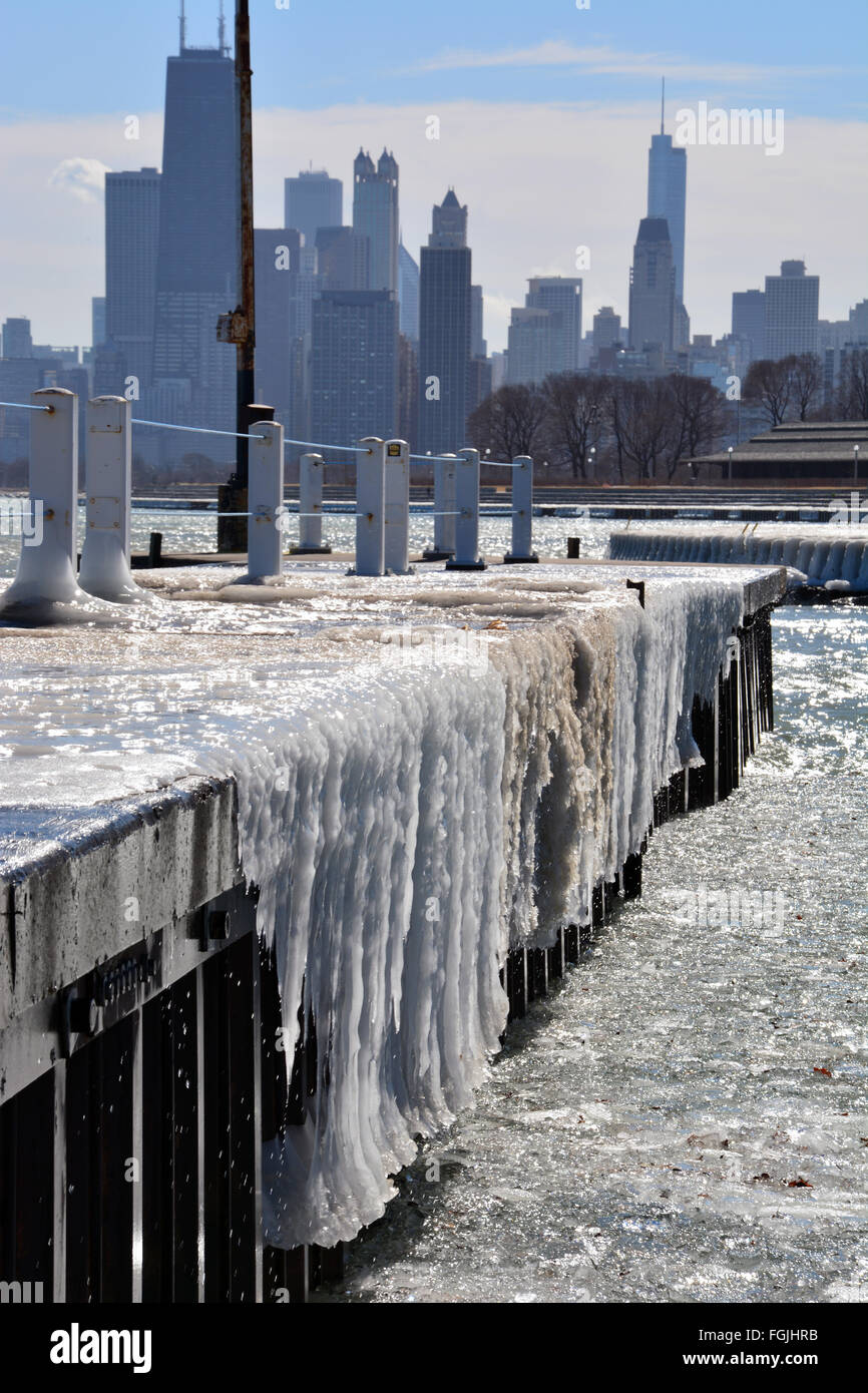 Spring ice melts off a break wall pier in Lake Michigan at the Diversey ...