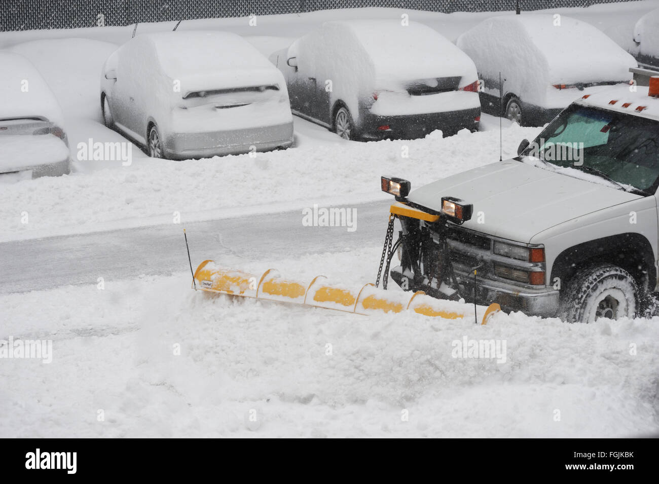 snowplow removing snow on the street after blizzard Stock Photo - Alamy