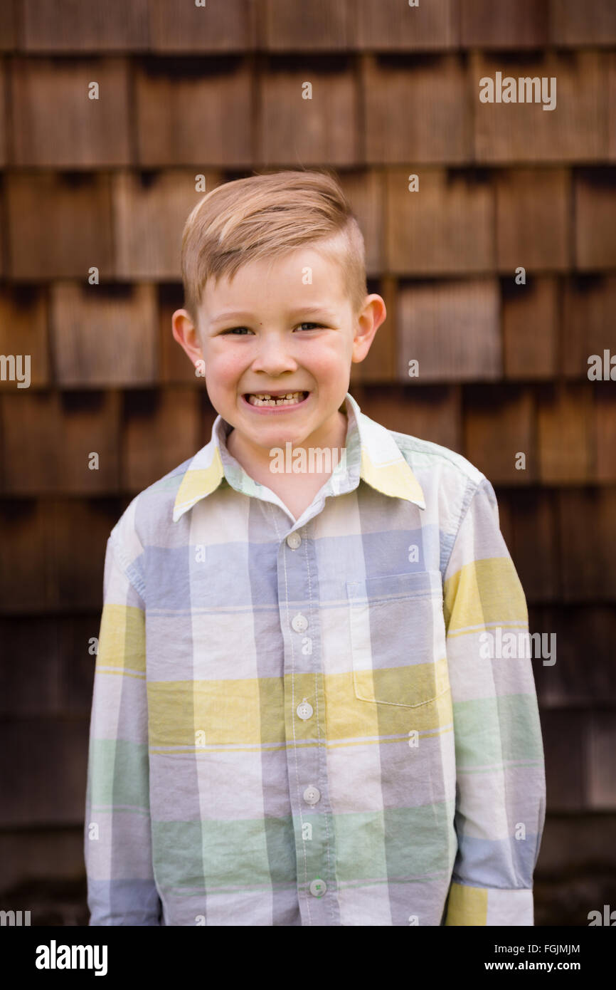 Young boy outdoors in a lifestyle portrait with natural light Stock ...