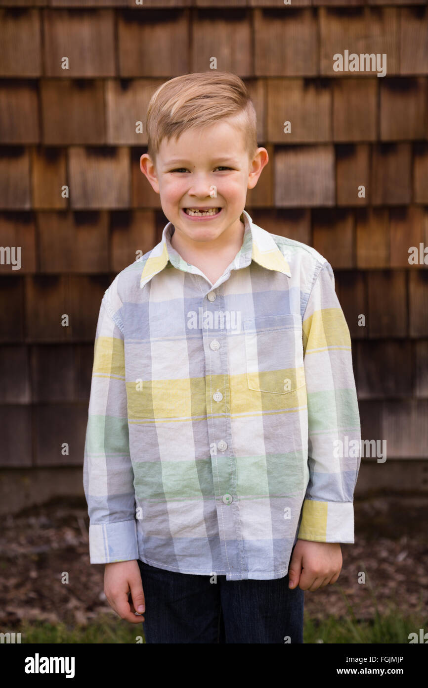 Young boy outdoors in a lifestyle portrait with natural light Stock ...