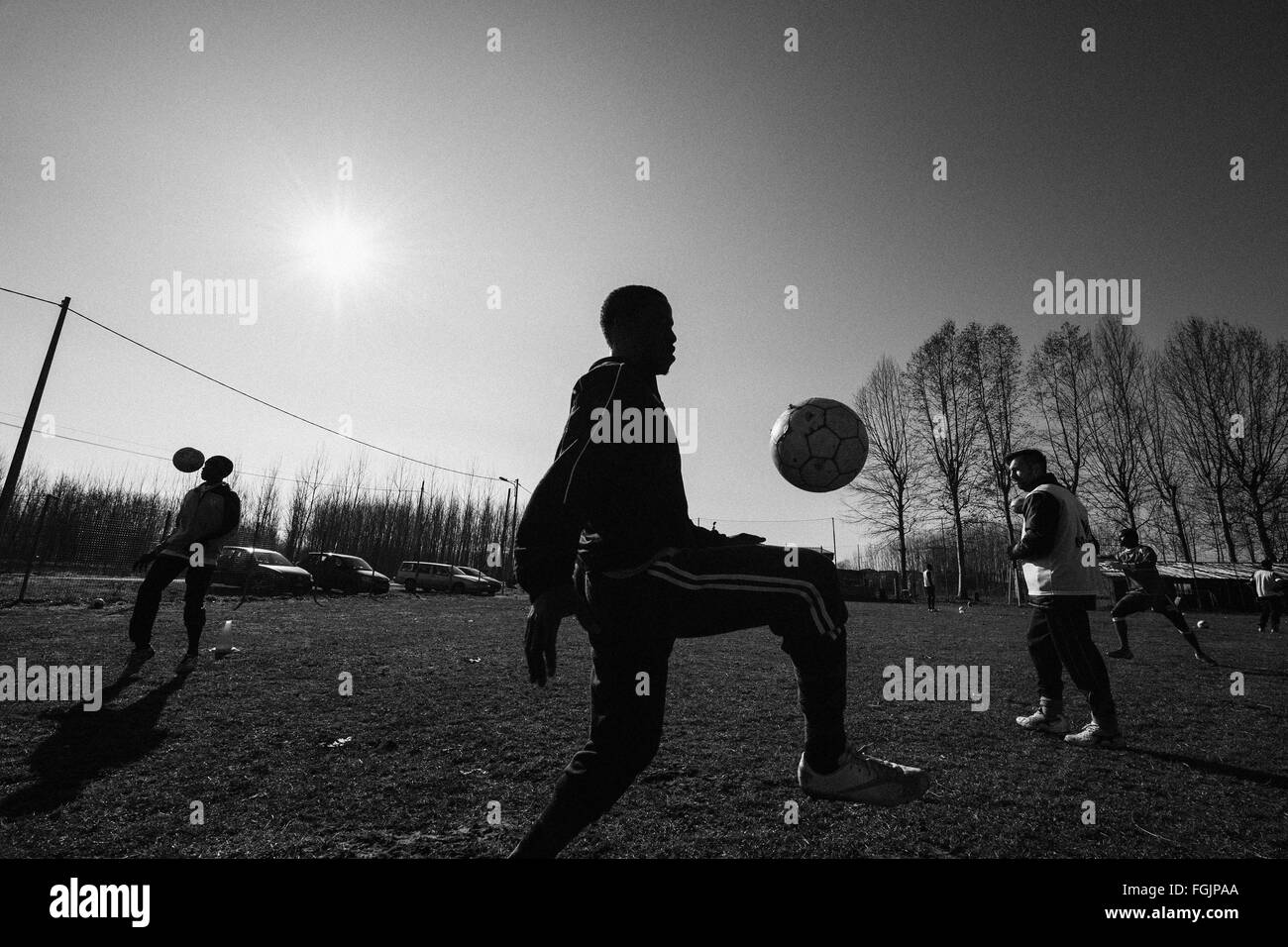 Italy, Parona, refugee center, football team Stock Photo - Alamy