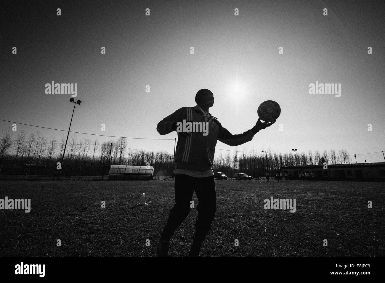 Italy, Parona, refugee center, football team Stock Photo - Alamy