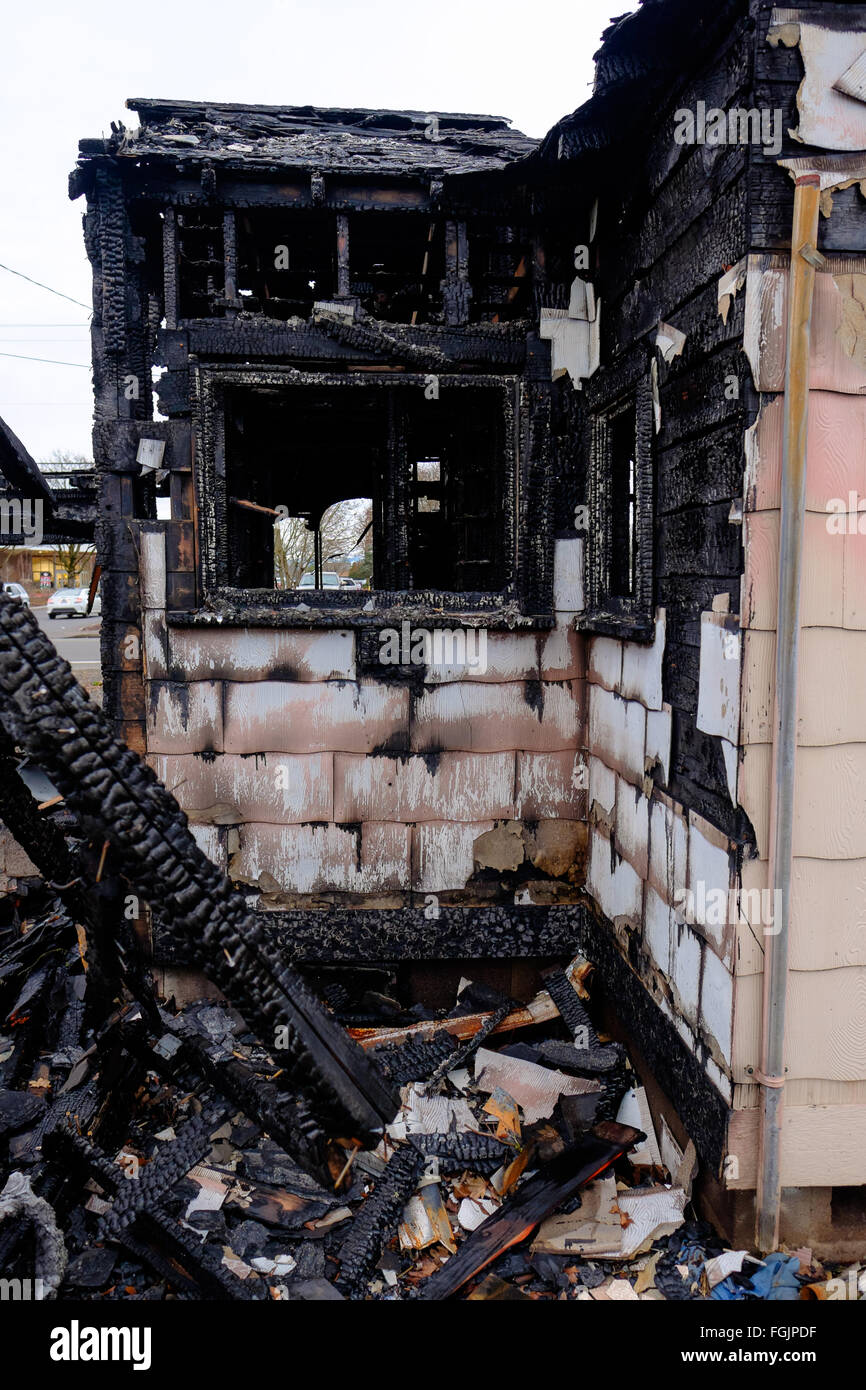 House burned almost completely in a major fire leaving only the damaged ...