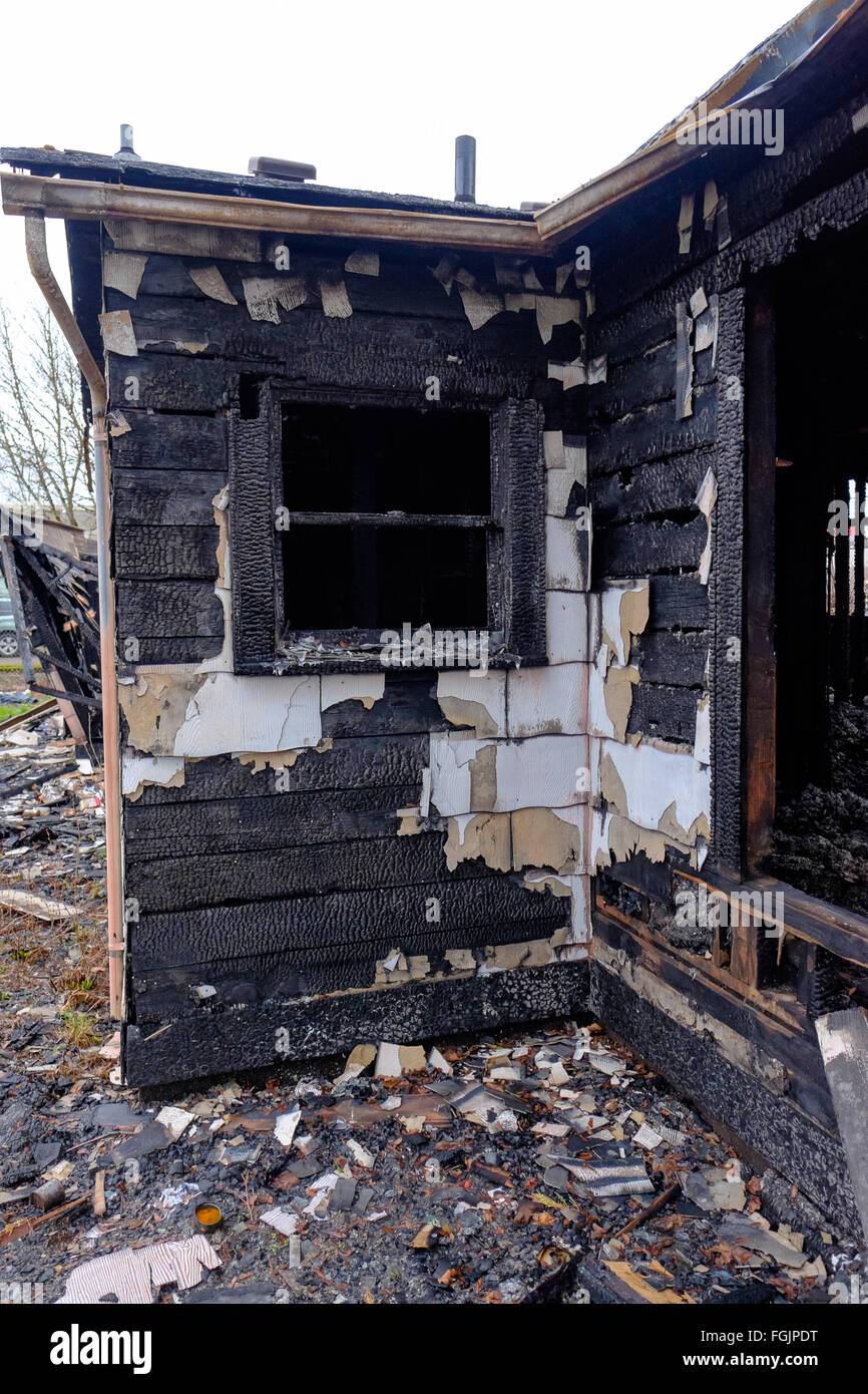 House burned almost completely in a major fire leaving only the damaged ...