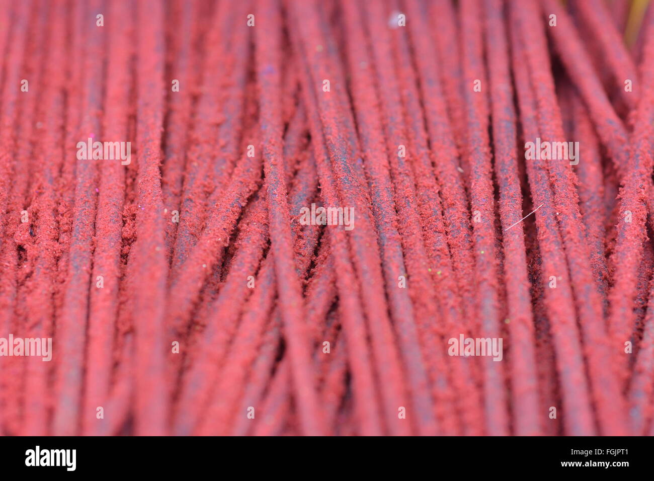 Indian incense sticks in red and brown colours Stock Photo - Alamy