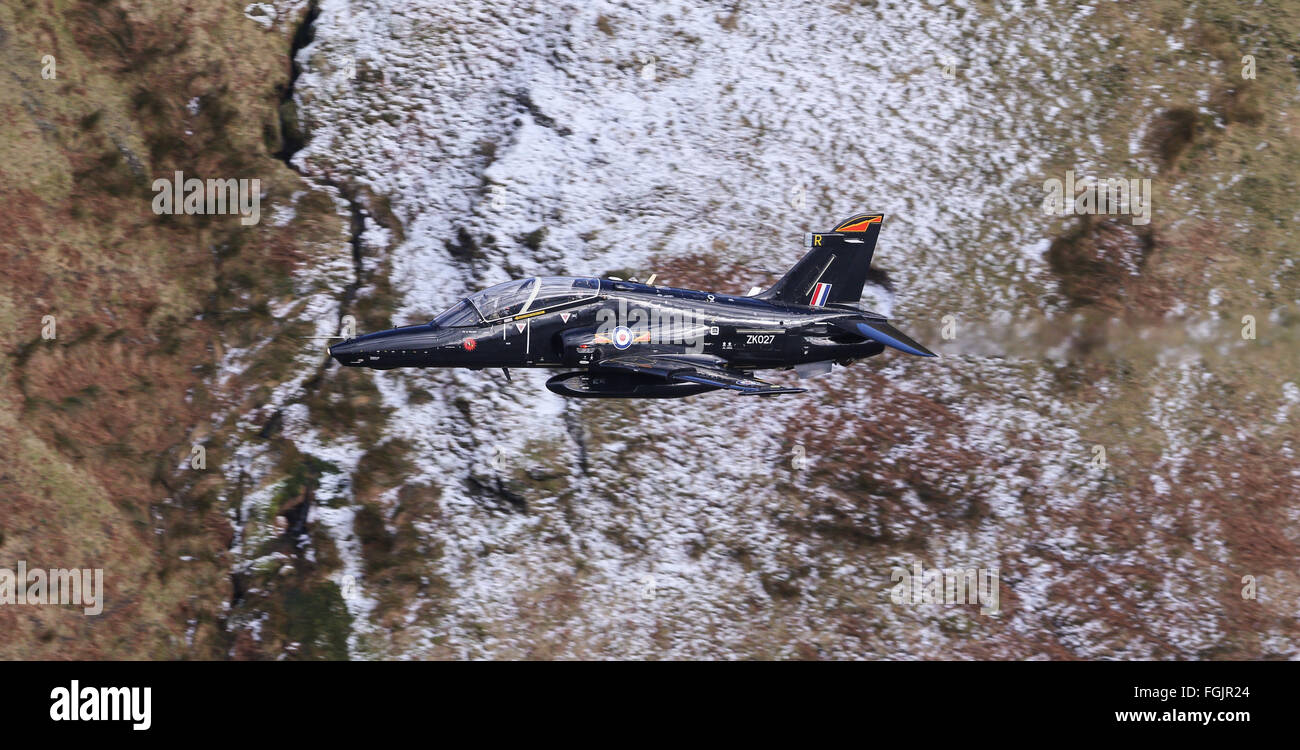 An RAF HAWK T2 training jet exiting the Mach Loop at high speed and low ...