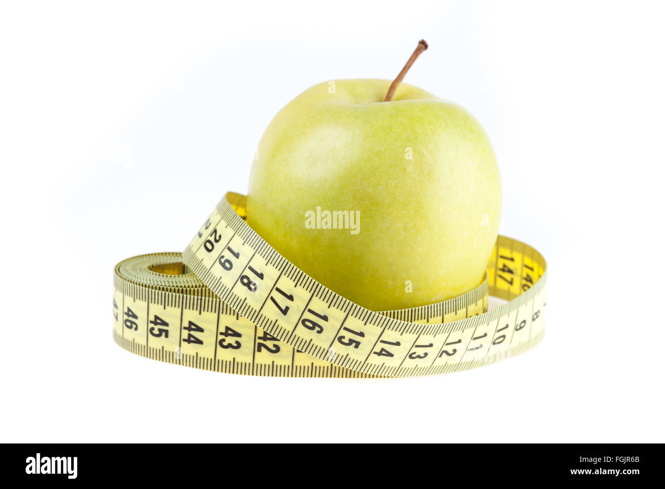 fresh green apple and tape measure isolated on white background Stock ...