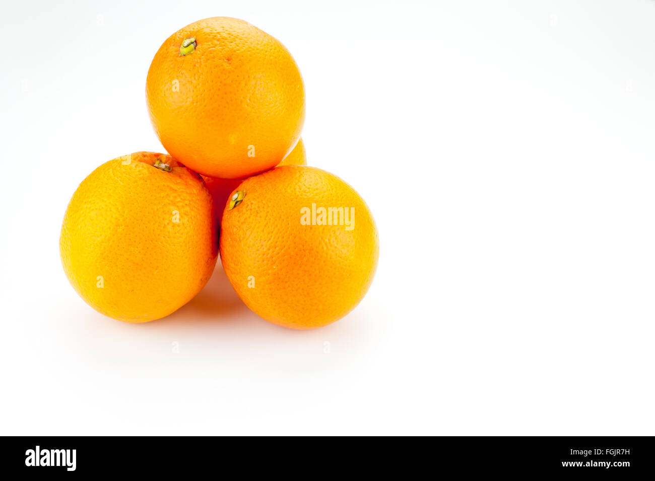 Piled up orange fruit isolated on a white background - 02 Stock Photo ...