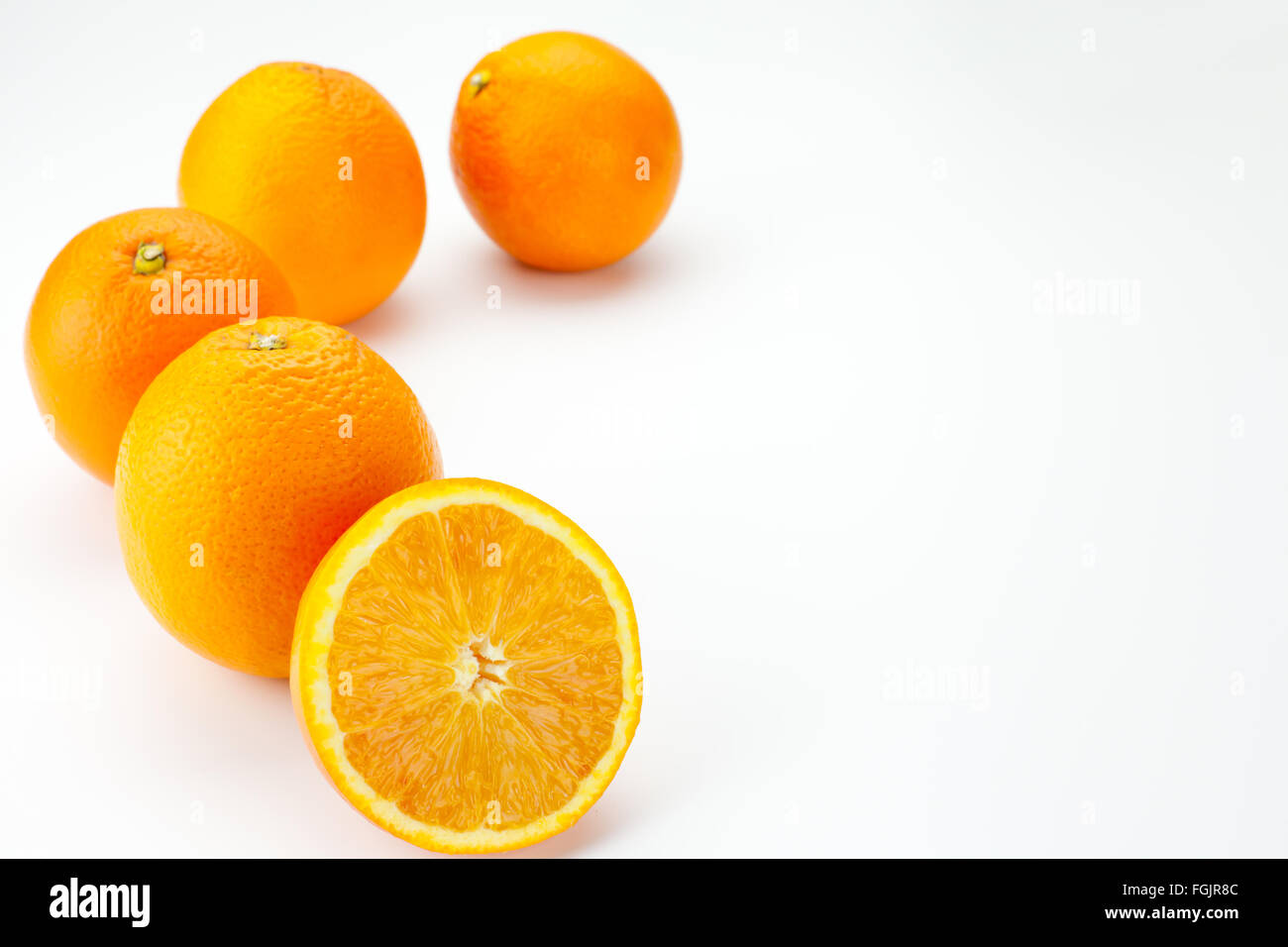 Piled up orange fruit isolated on a white background - 07 Stock Photo ...